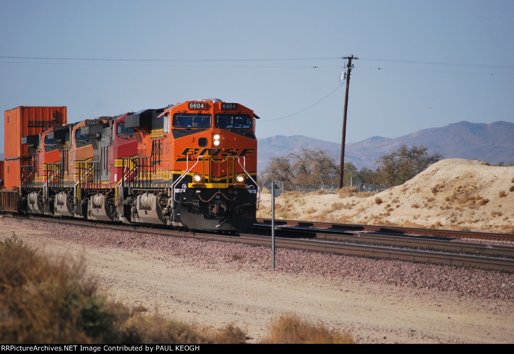 BNSF 6604 leads a Hot Z out of Los Angeles, Ca into the BNSF B]rstoh yard for a crew change and ...